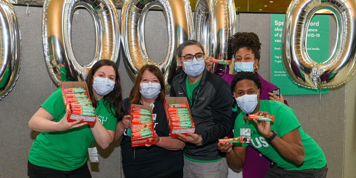 Rush Celebrates 100,000th COVID-19 Vaccination
